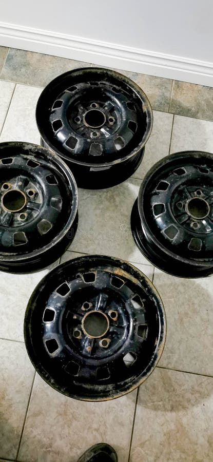 Old worn out truck rims stock photo. Image of street - 303261332