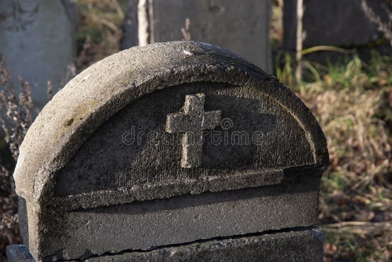 Old and Worn Tombstone with a Catholic Cross Stock Image - Image of ...