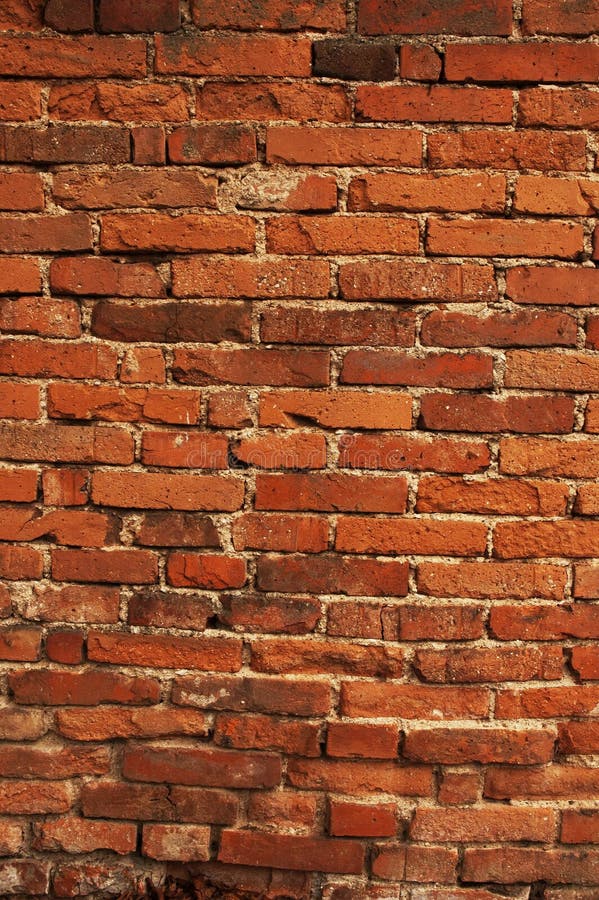 Old Worn Vertical Brick Wall Stock Image - Image of masonry, exterior ...
