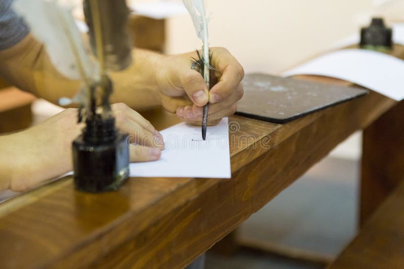 Writing with a Quill Pen and an Ink Bottle Stock Image - Image of ...