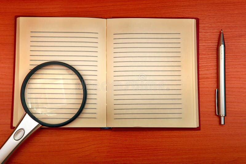 Old Writing Pad and Loupe stock photo. Image of lens - 29548232