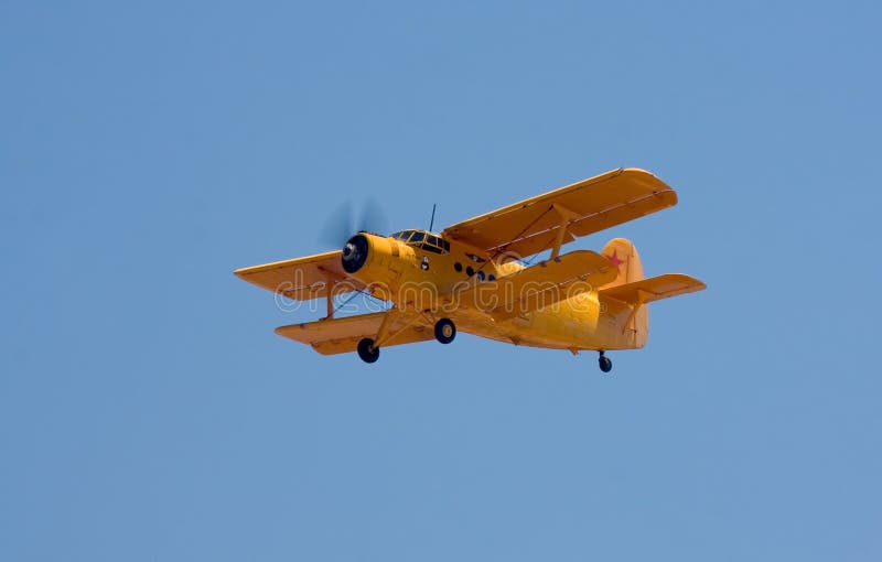 Old Yellow Biplane Aircraft on Colorful Cloudy Sky. Editorial Image ...