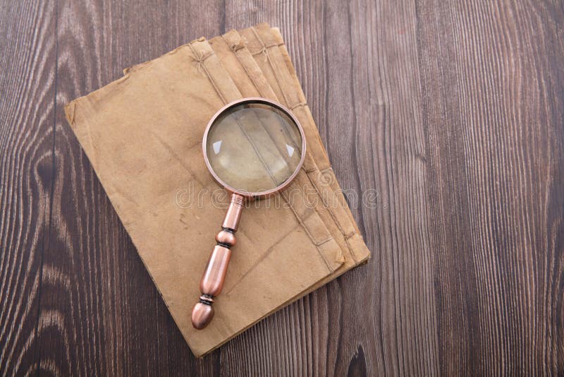 Old Yellow Books and Magnifiers on the Table Stock Image - Image of ...