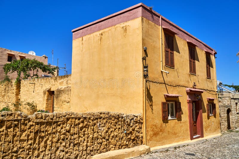 Old yellow building stock photo. Image of corner, outdoors - 100064534