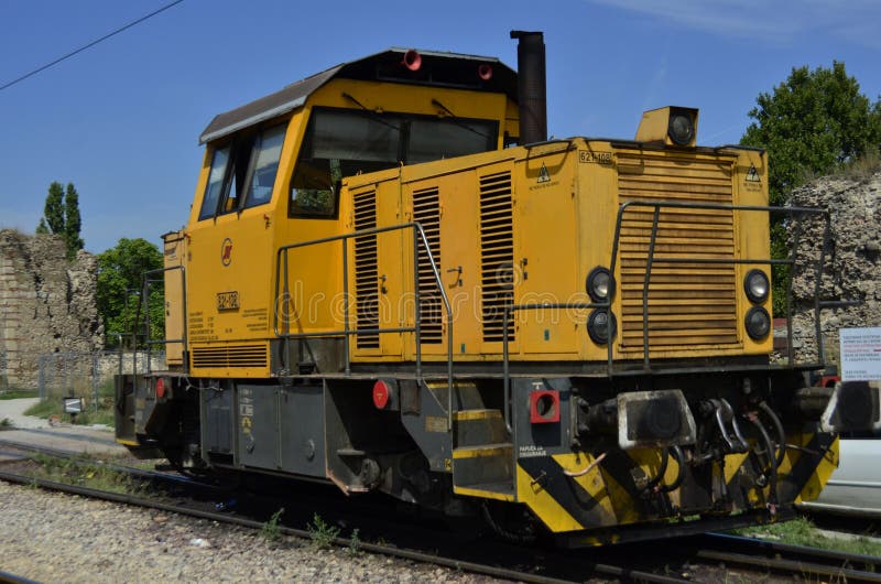 Old Yellow Cargo Hauling Locomotive Stock Photo - Image of cargo ...