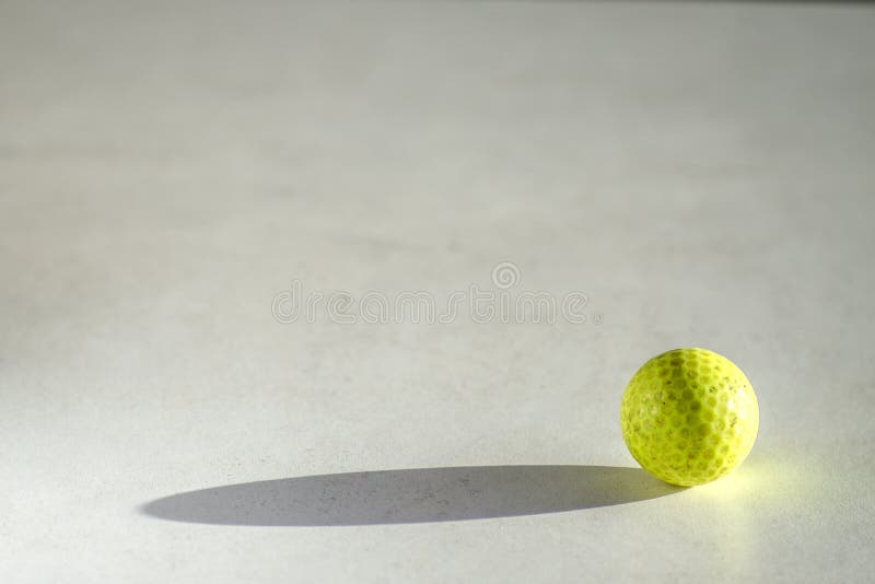 Old Yellow Golf Ball on White Backdrop Stock Photo - Image of hard ...