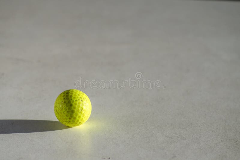 Old Yellow Golf Ball on White Backdrop Stock Image - Image of glossy ...