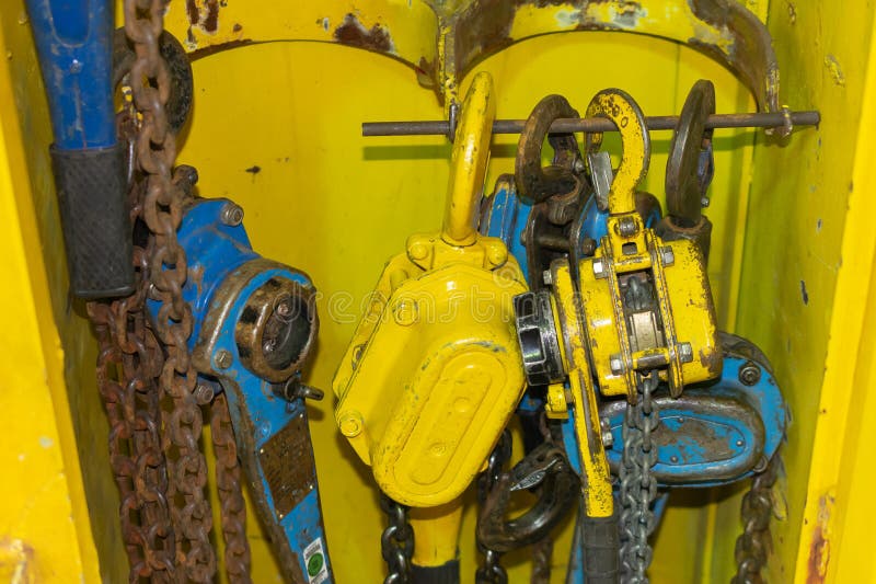 Old Yellow Manual Chain Winch Stock Photo - Image of plant, activity ...
