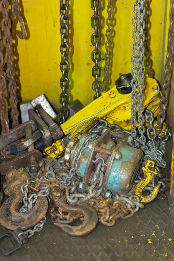 Old Yellow Manual Chain Winch Stock Photo - Image of metal, covered ...