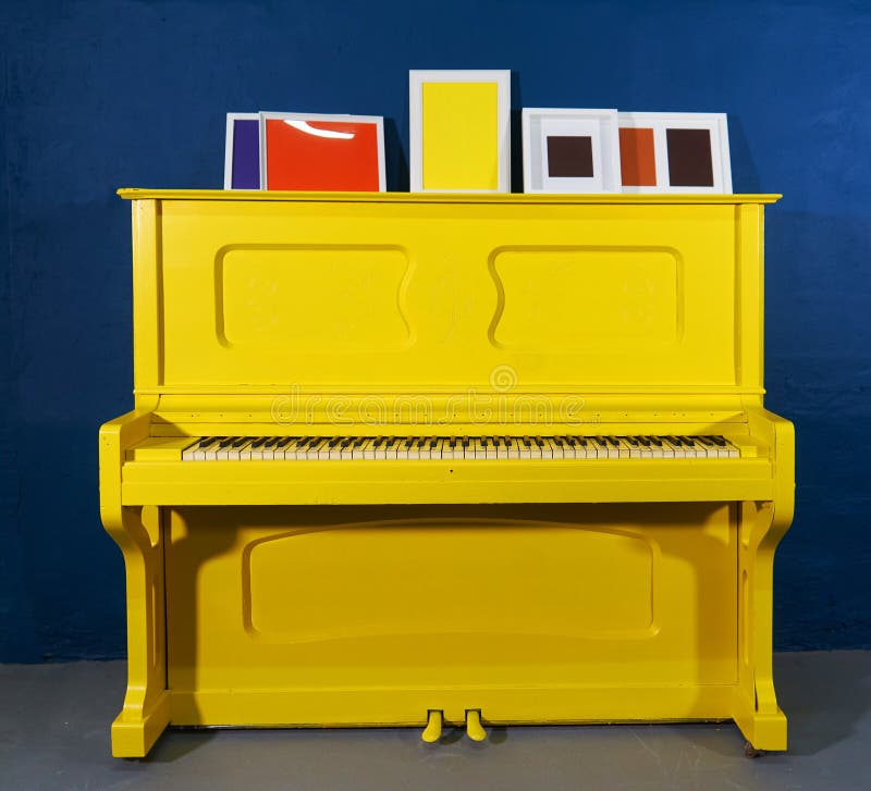 Yellow Piano on Blue Background Stock Photo - Image of wall, minimalism ...