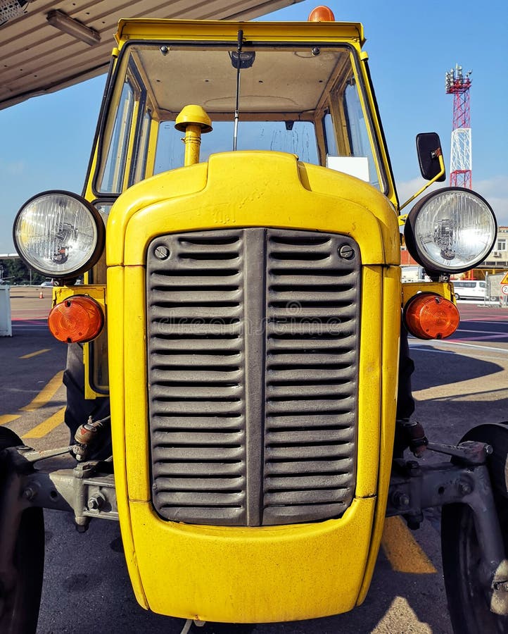Old yellow Tractor stock image. Image of machinery, history - 119652475