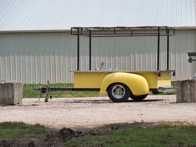 Old Yellow Trailer in the Park Stock Photo - Image of object, field ...