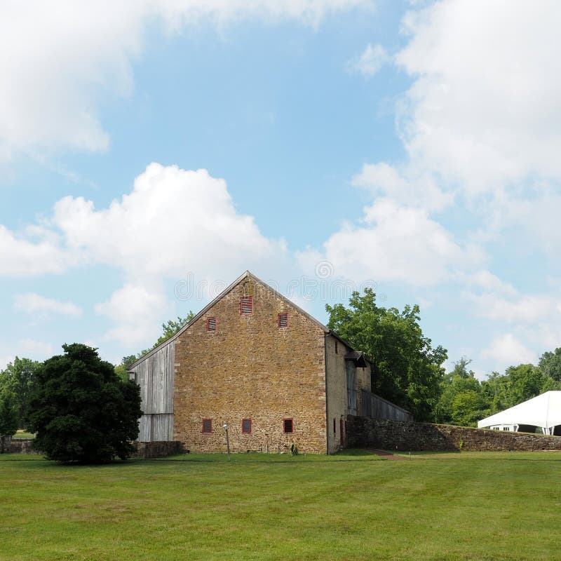 The Olde Barn is in the Background on this Summer Day. Stock Photo ...