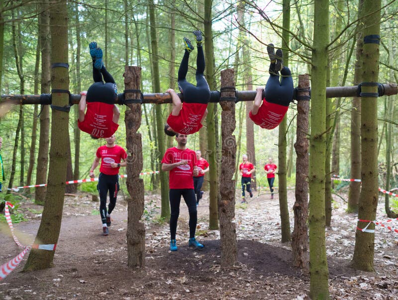 Athletes Doing a Survival Run Editorial Stock Image - Image of human ...