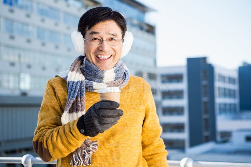Older Asian Man with Coffee To Go Stock Image - Image of beverage ...