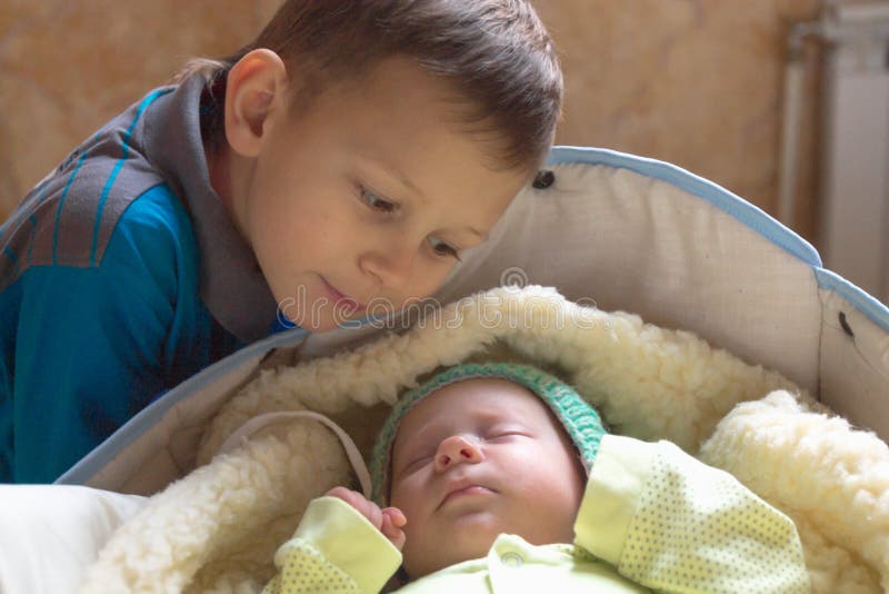 Older Brother Looks after the Youngest with Love Stock Photo - Image of ...