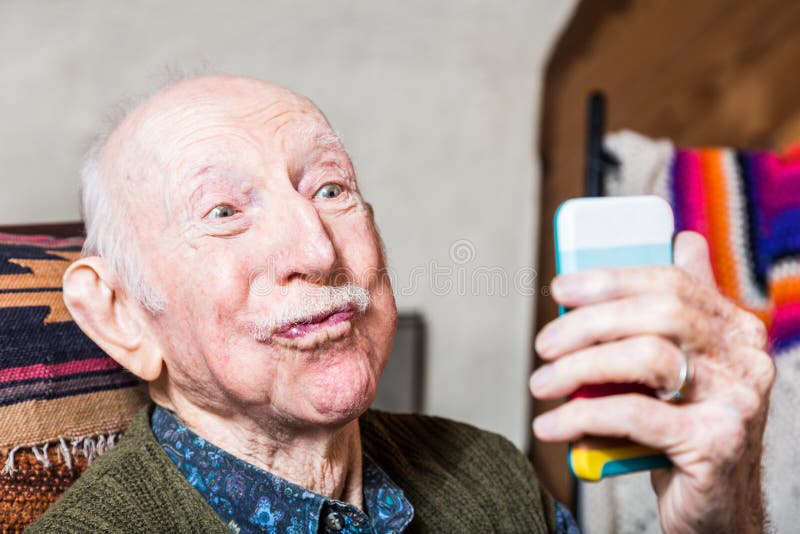 Older Gentleman with Smartphone Stock Photo - Image of seated, grin ...