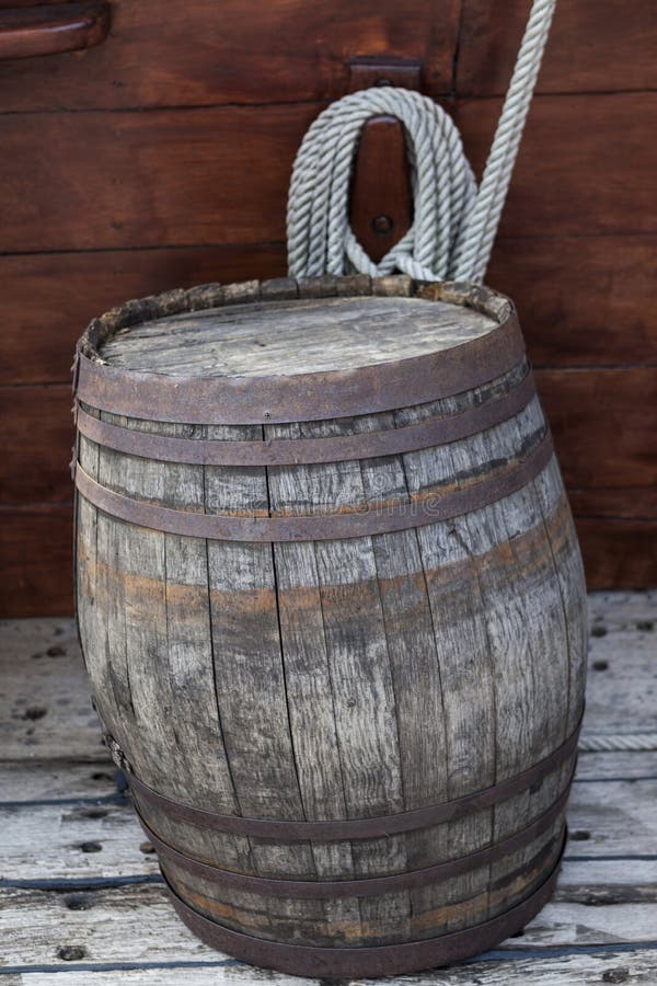 Older Intricate Marine Ropes and Old Wooden Barrel on Deck of a Ship ...