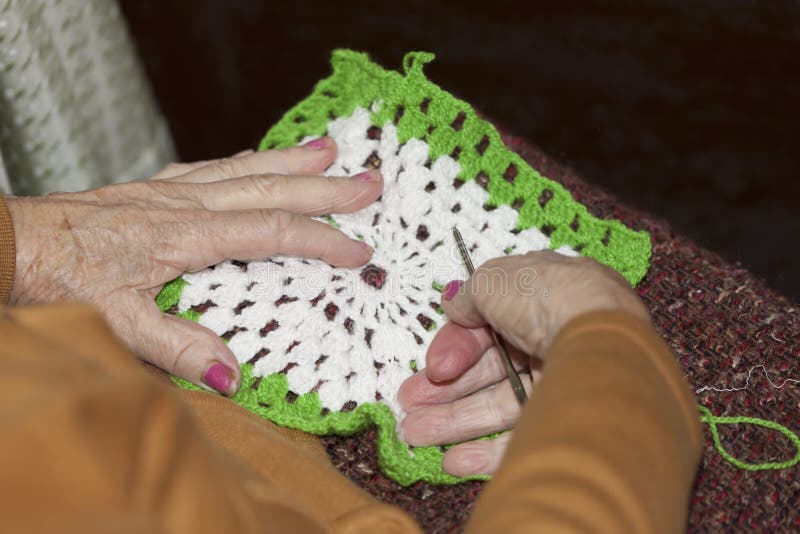 An Older Lady Doing Crochet Stock Photo - Image of hand, knitting ...