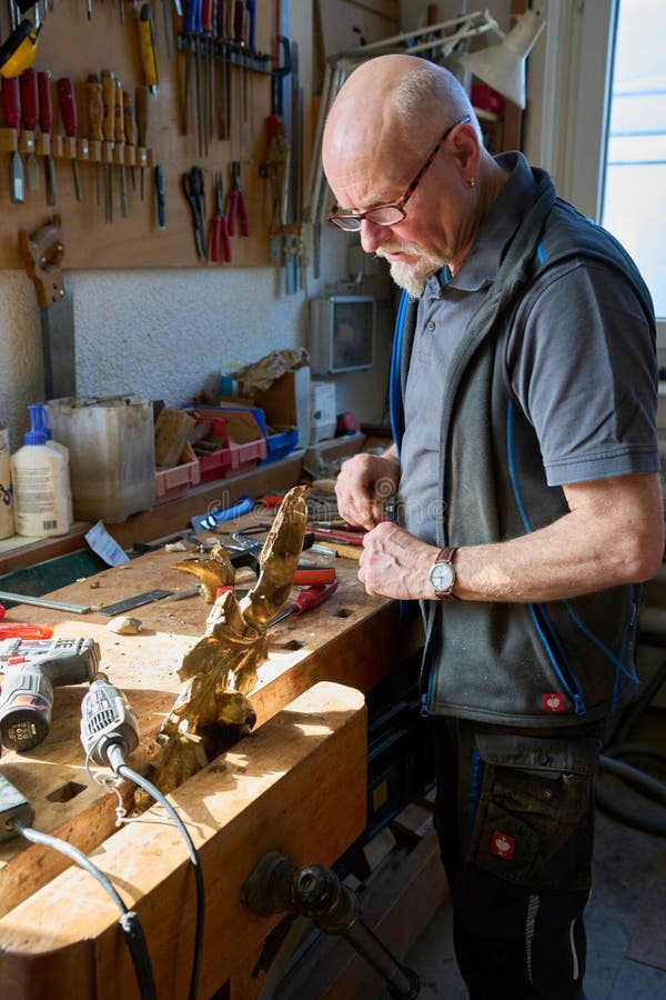 Older Male Carpenter is Hard at Work in His Workshop Editorial Image ...