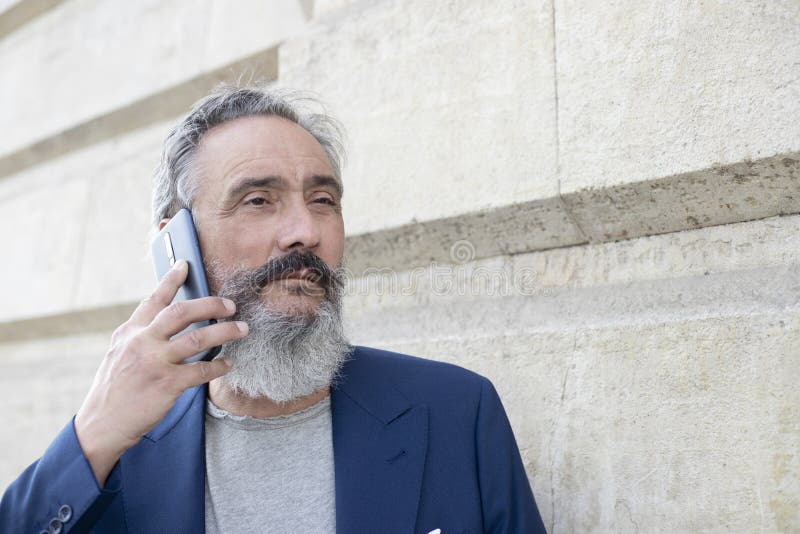 Older Man with Beard Talking on Mobile Phone Stock Image - Image of ...