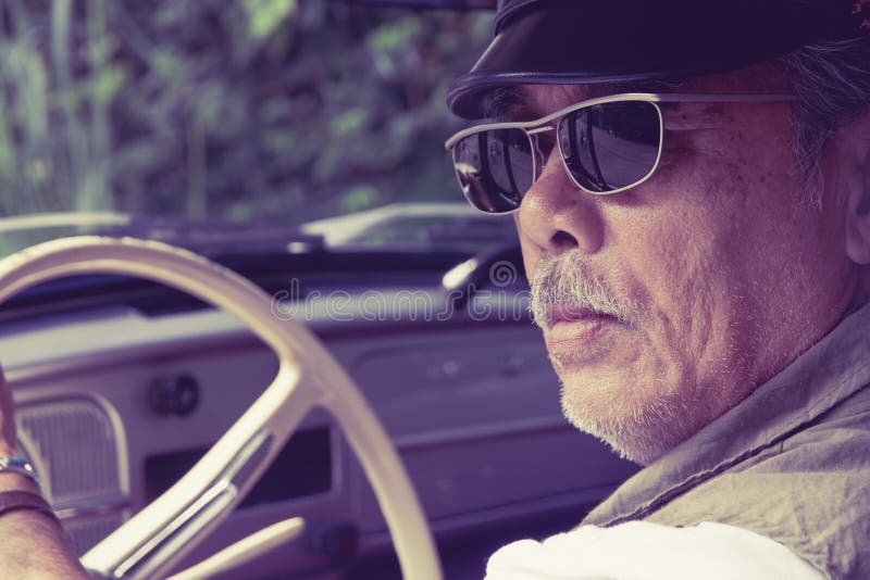 Older man driving a car stock image. Image of vehicle - 55492885