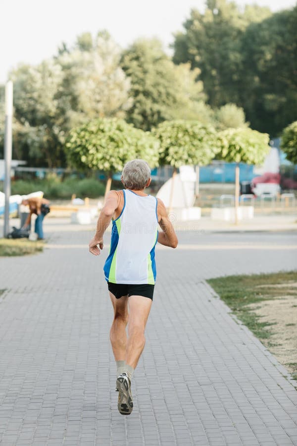 Older Man is Engaged in Running in the Fresh Air Stock Image - Image of ...