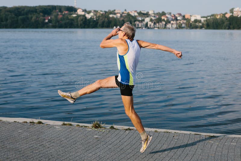 Older Man is Engaged in Running in the Fresh Air Stock Photo - Image of ...