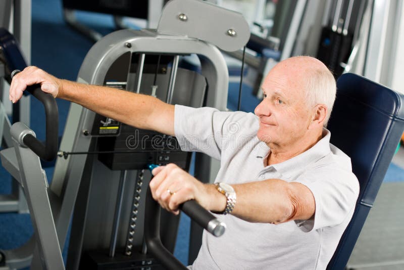 Older Man Exercising at the Gym Stock Photo - Image of club, work: 10561556