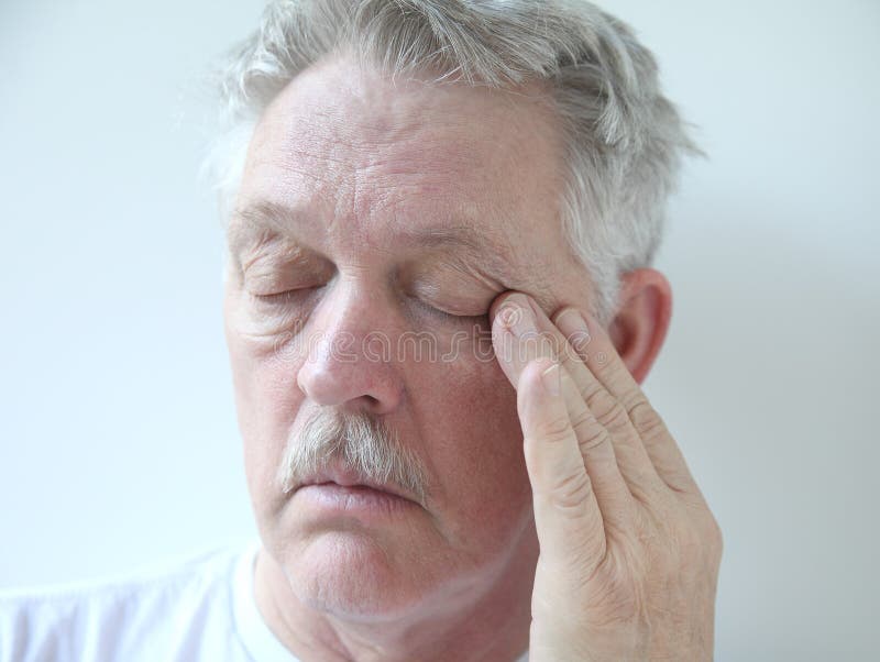Older man with eye fatigue stock photo. Image of face - 28978268