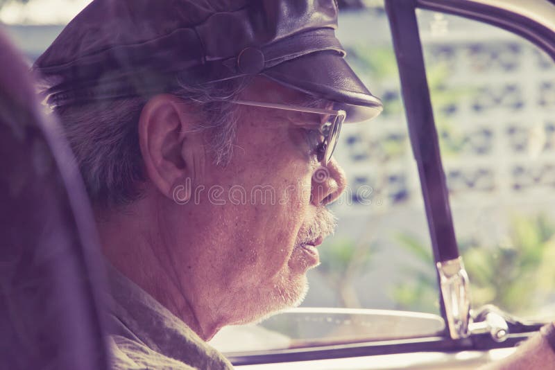 Older man driving a car stock photo. Image of vehicle - 55492848