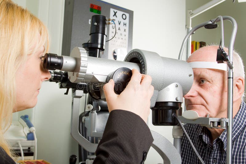 Older Man Having Eye Examination Stock Image - Image of optician ...