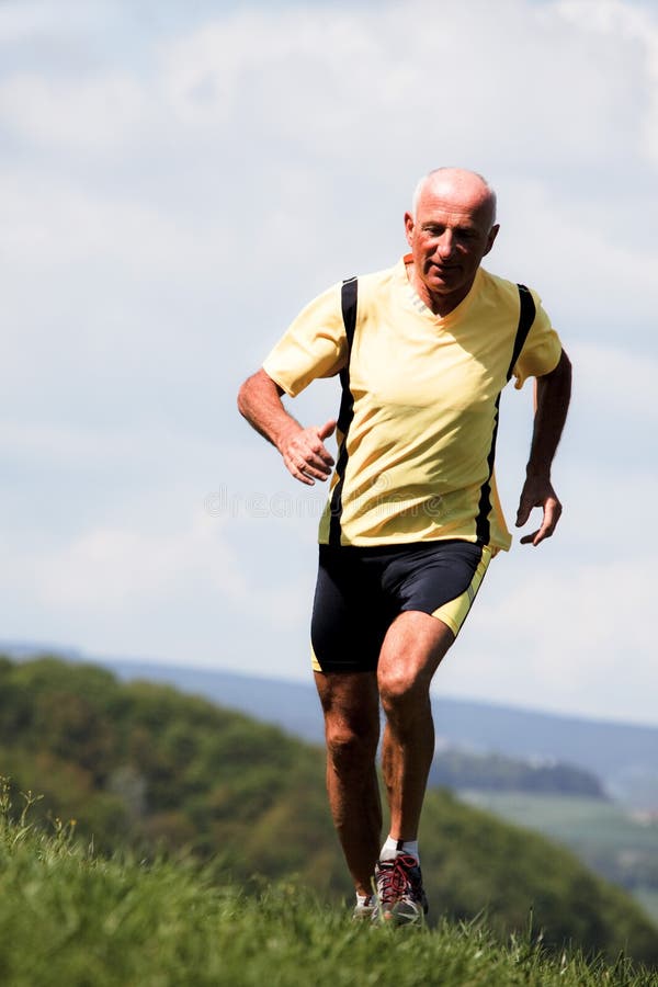 Older Man Jogging Running on Meadow Stock Photo - Image of running ...