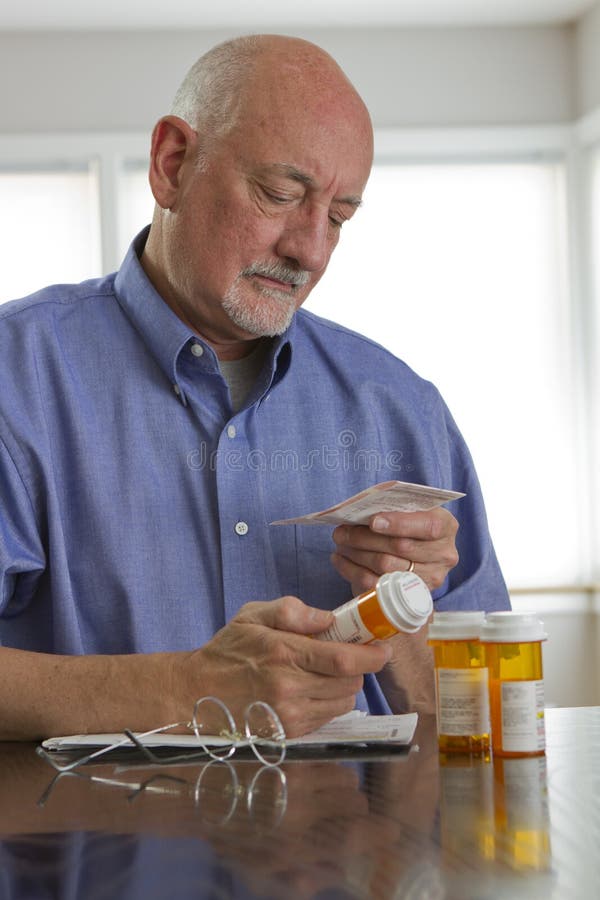 Older Man with Prescription Medications, Vertical Stock Photo - Image ...