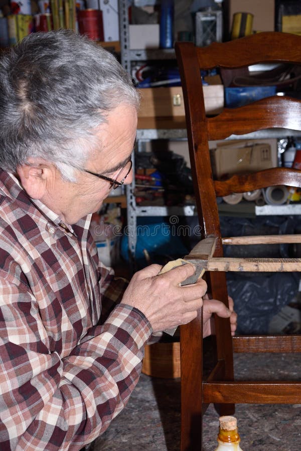 Older Man Restoring a Chair Stock Photo - Image of restoring, carving ...