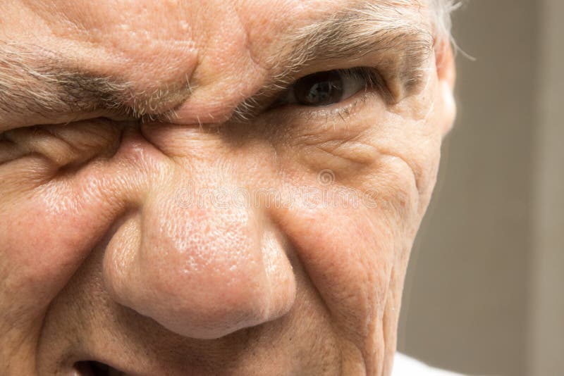 Older Man Squinting with One Eye Stock Image - Image of senior, health ...