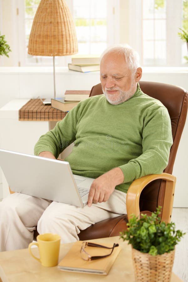 Old Man Sitting at Home Reading Stock Image - Image of domestic ...