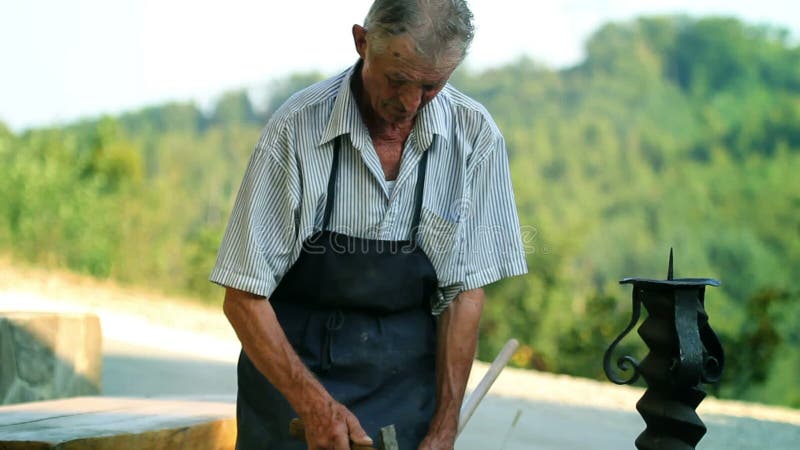 Older Man Working in Front of His House Stock Footage - Video of ...