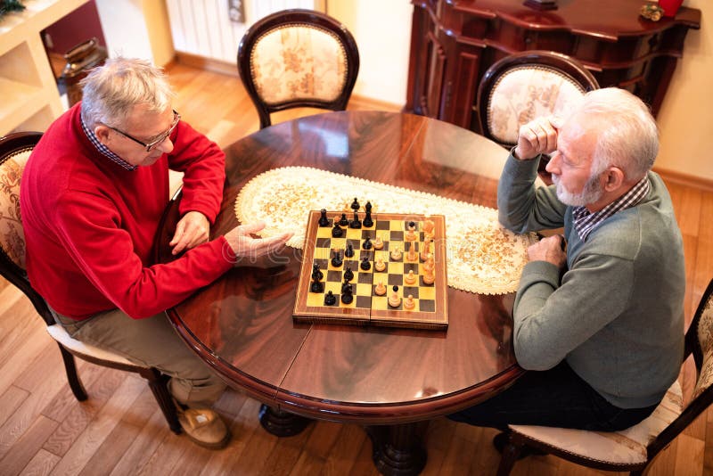 Older Men Playing a Game of Chess Stock Photo - Image of nursing ...