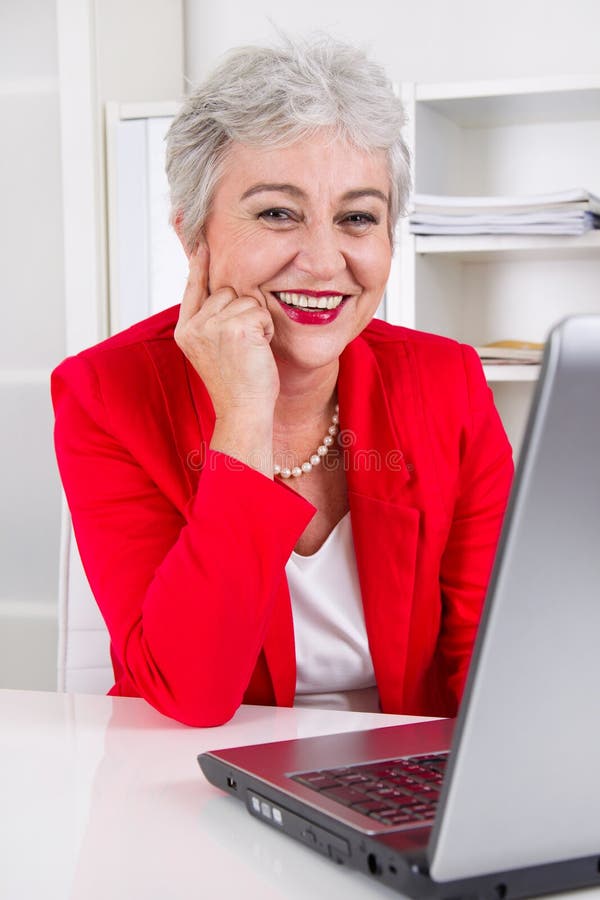 Older Office Worker with Laptop Stock Image - Image of management ...
