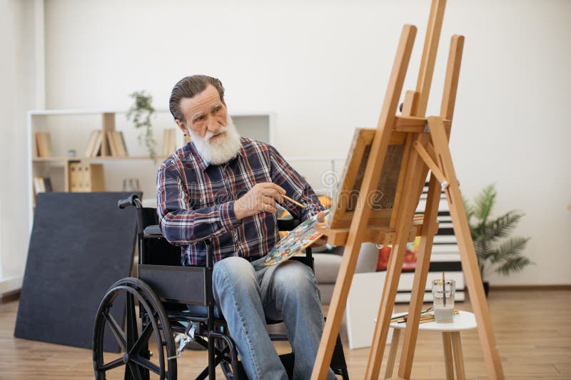 Older Painter with Disability Working on Art Project Indoors Stock ...