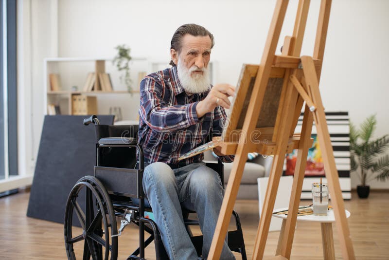 Older Painter with Disability Working on Art Project Indoors Stock ...