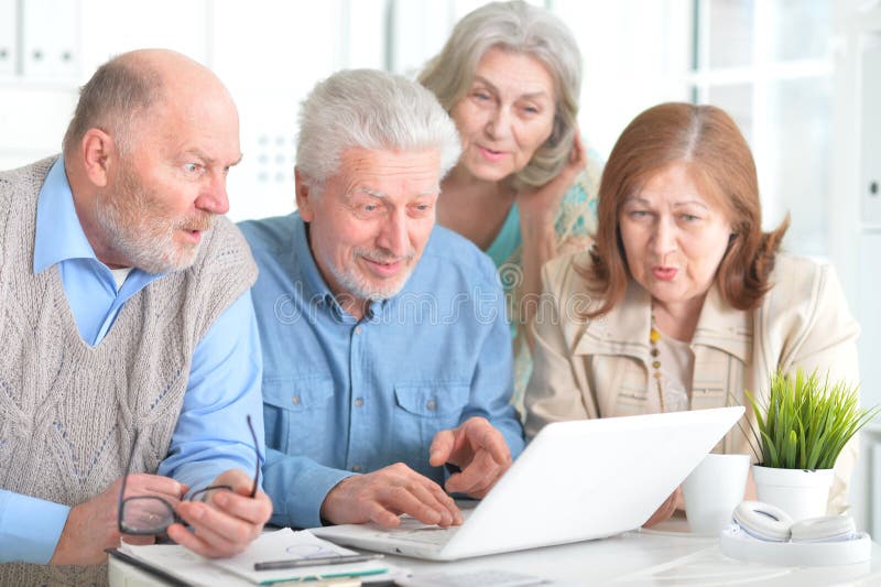 Older people with a laptop stock image. Image of elderly - 88125861