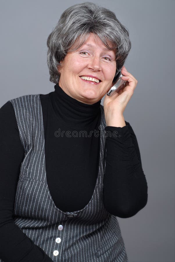 Older woman calling stock photo. Image of female, conversation - 4537814