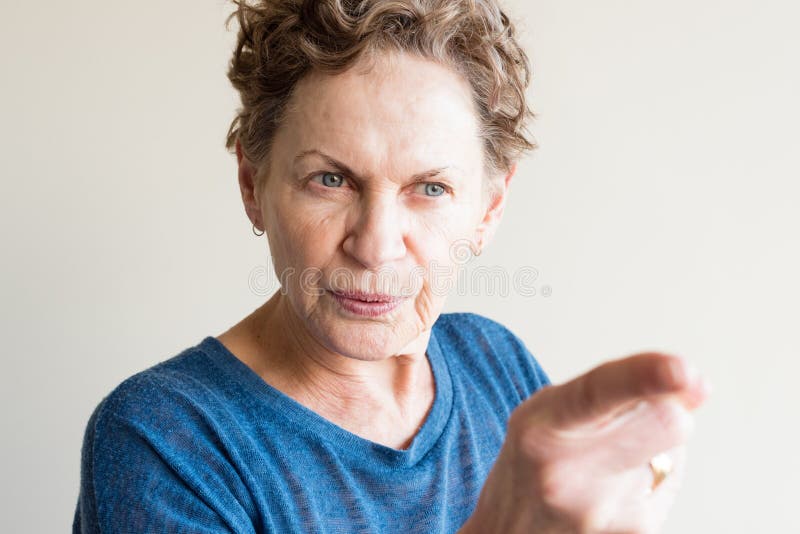 Older Woman Pointing Finger Stock Image - Image of shoulders, woman ...