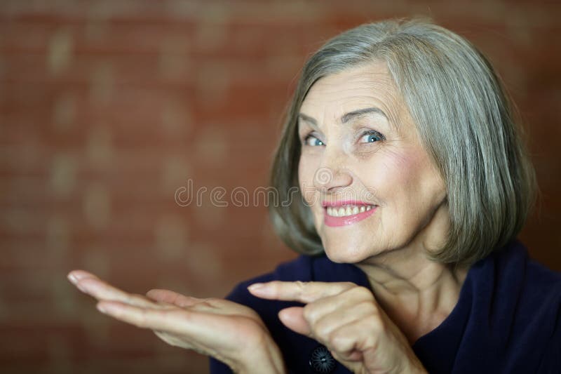 Older woman pointing stock image. Image of background - 68688893