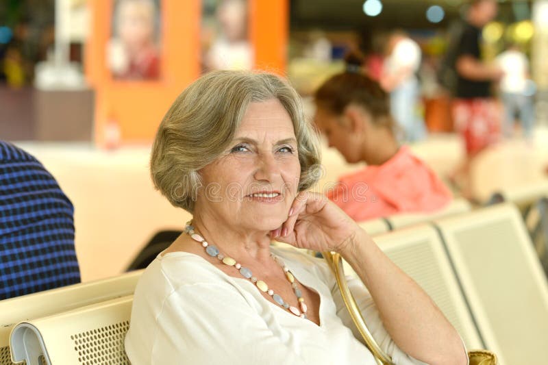 Older Woman in the Waiting Room Stock Image - Image of senior, casual ...