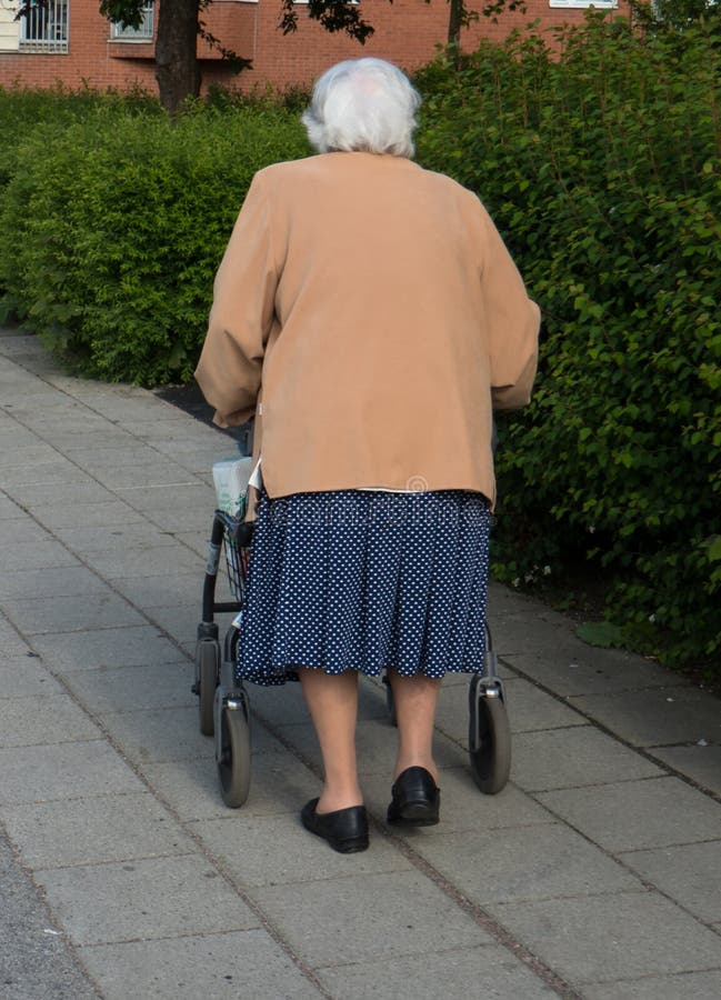 Older Woman with Walker, on a Walkway in Sweden. Editorial Photography ...