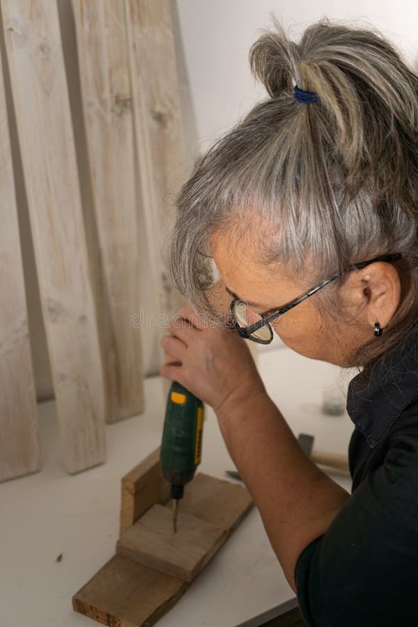 Older Woman Working in Her Workshop Stock Photo - Image of carpenter ...
