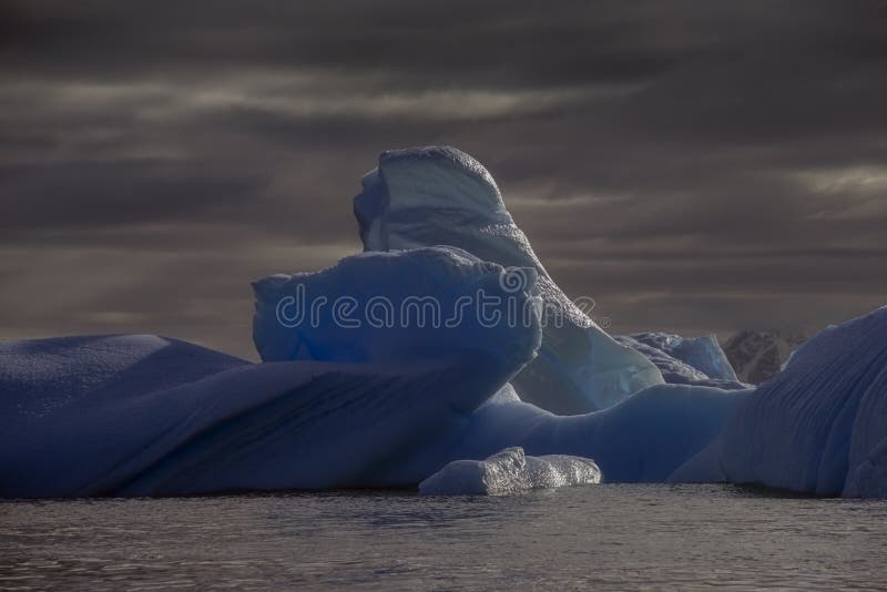 Deep Blue Ancient Glacial Iceberg, Antarctica Stock Photo - Image of ...